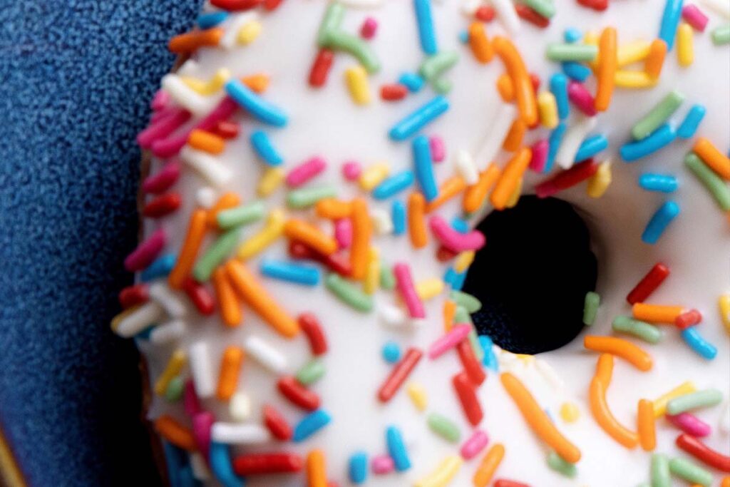 White Chocolate Donut with Color Sprinkles - Phoenix Foods
